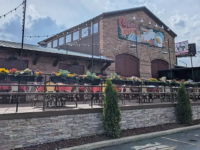 This patio setup whispers "stay awhile" – exactly what great pizza places should do.