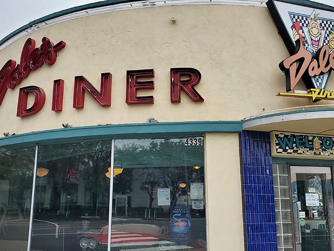 That classic blue tile work hints at the timeless comfort food waiting inside this neighborhood treasure.