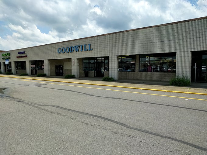 The unassuming exterior of Goodwill Hermitage hides a labyrinth of potential. Every parking space filled means someone's hunting for their next great find.