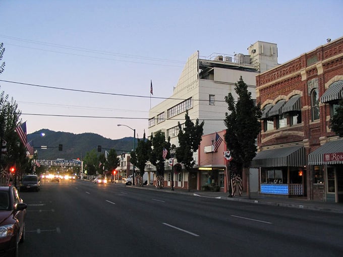 Evening settles over Grants Pass's historic district, where the mountains create a perfect backdrop for retirement adventures.
