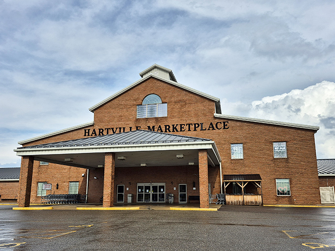 The brick facade of Hartville Marketplace stands like a fortress protecting countless treasures within its walls.