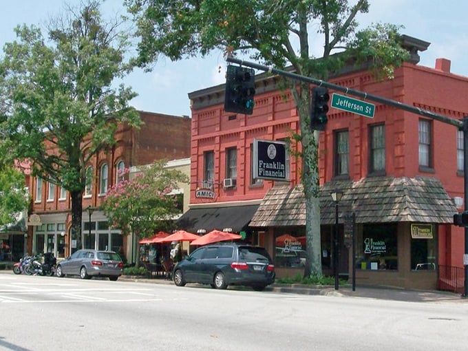 Tree-lined streets create natural galleries where every home tells a Southern story.