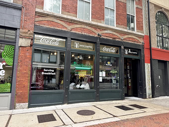 Downtown brick and old-school signage – this is where sandwich artistry happens! Reuben's sits proudly among Atlanta's historic buildings like it's been there since Truman was president.