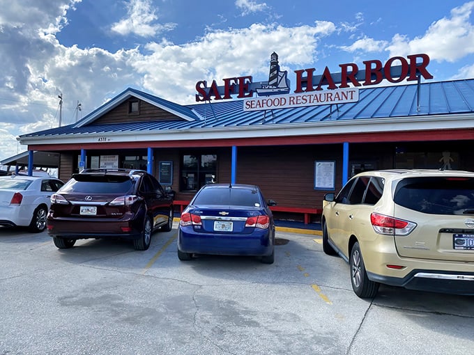Blue trim against a bright Florida sky – Safe Harbor looks exactly how a proper seafood joint should look.