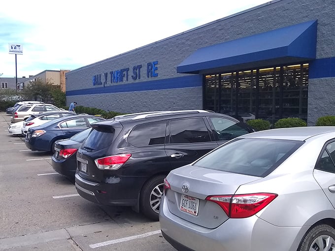 Valley Thrift Store welcomes shoppers with its distinctive blue stripe – the retail equivalent of finding money in your old jacket pocket.