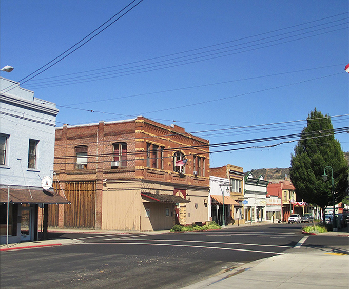 Historic brick buildings stand proud like old-timers sharing tales of gold rush glory days.