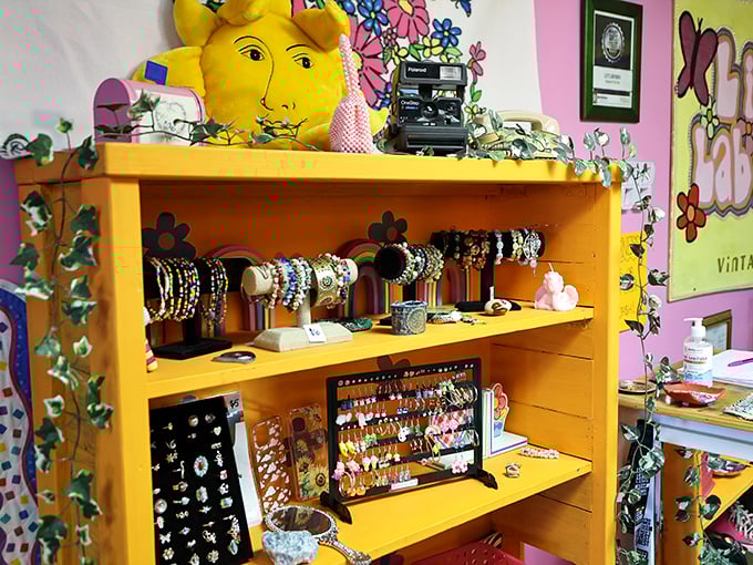 Treasure hunters rejoice! This sunny yellow jewelry display offers affordable sparkle with whimsical mushroom and rainbow earrings galore.