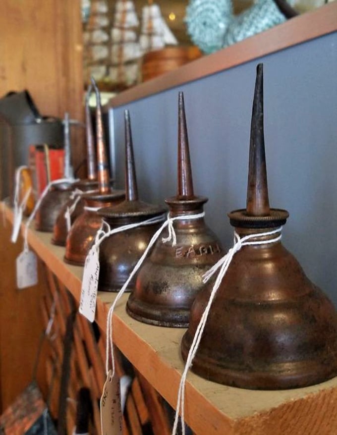 These vintage oil cans aren't just tools—they're industrial sculptures from an era when even utilitarian objects were crafted with character and built to last.