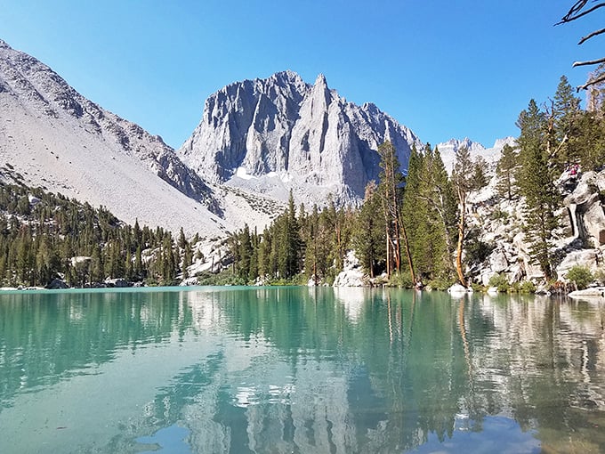Big Pine Lakes serves up that impossible turquoise water that makes you question whether someone secretly poured in Caribbean food coloring.