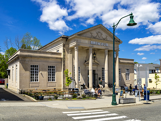 This isn't just any brew pub—it's a temple to hops housed in what looks like a miniature Greek revival bank. Banking on beer never looked so dignified.