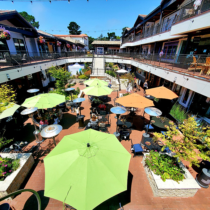 Carmel Plaza's courtyard feels like the secret garden party you've always wanted to be invited to – complete with those perfect California umbrellas.