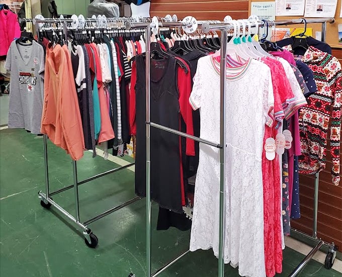 Fashion archaeology at its finest. Each rack tells a different story—from last season's trends to vintage gems waiting for their second act on a new stage.