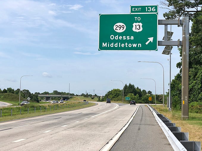 That highway sign might as well read "Exit 136: To Simpler Times." The modern road leading to Odessa's historic embrace is the ultimate before-and-after shot.