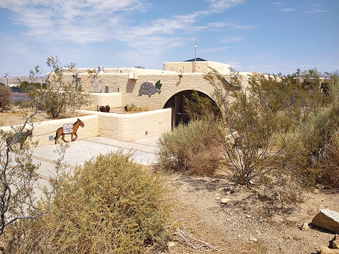The Desert Discovery Center's adobe-style architecture blends perfectly with its surroundings, like nature's own camouflage with a touch of artistic flair.