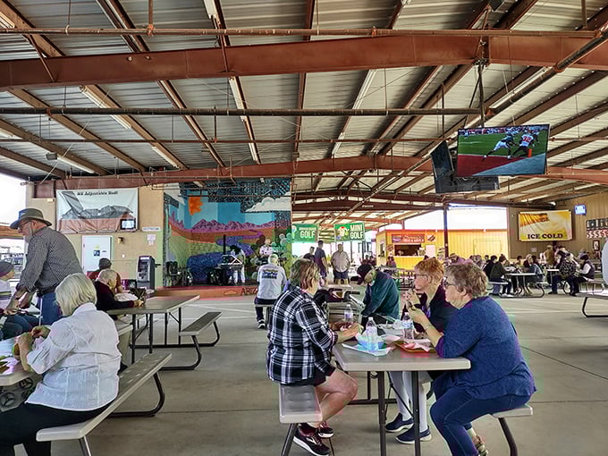 Where food court meets community center – the beating heart of Arizona Market Place where strangers become friends over shared tables and trading tips.