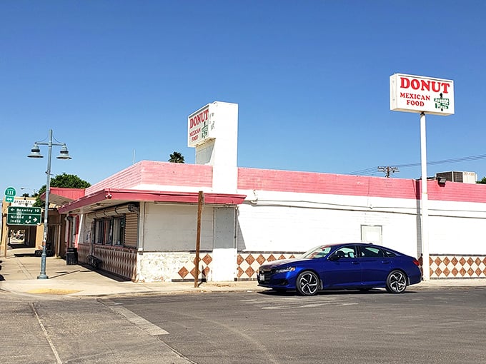 The pink-trimmed Donut Mexican Food combo shop embodies California's culinary fusion culture—where breakfast pastries and tacos happily coexist under one roof.