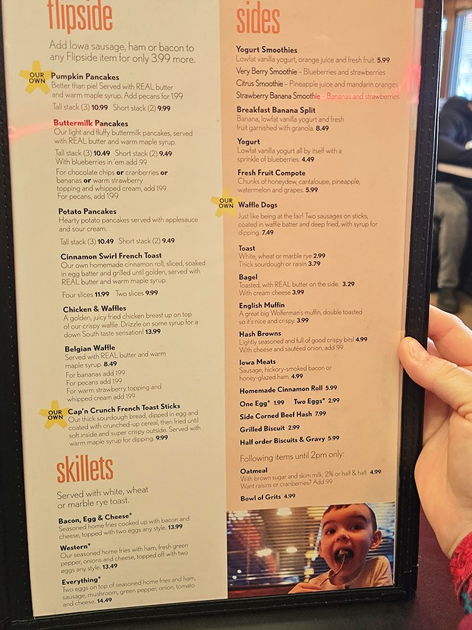 The menu reads like a love letter to American classics – pancakes with REAL butter, Waffle Dogs, and skillets that could fuel a farm worker all day.