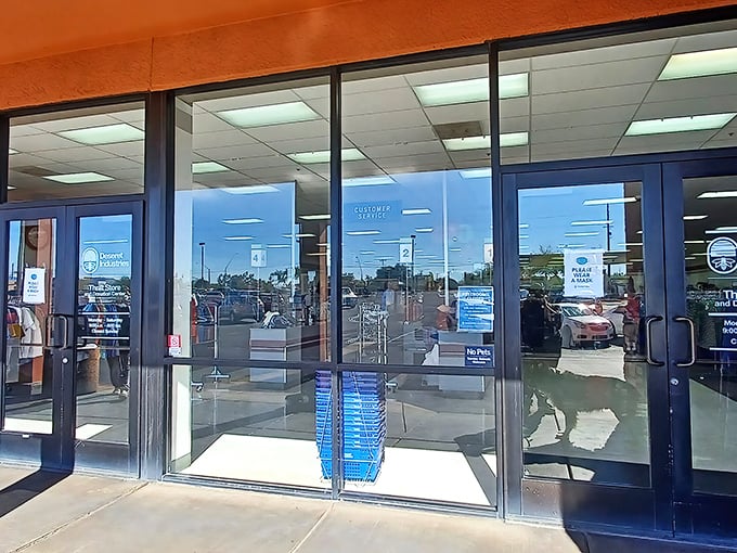 Those blue-framed glass doors aren't just an entrance—they're a portal to a parallel universe where time disappears and shopping carts fill mysteriously.