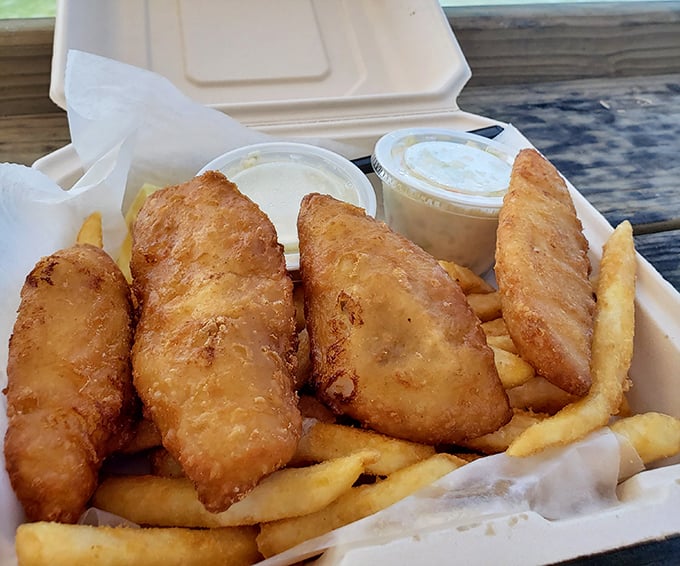 Golden, crispy, and utterly irresistible – this fish and chips platter is what seafood dreams are made of.