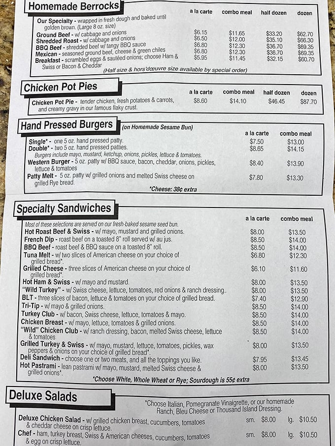 The menu board reads like a love letter to comfort food – berrocks, pot pies, and hand-pressed burgers that would make any fast-food chain weep with inadequacy.