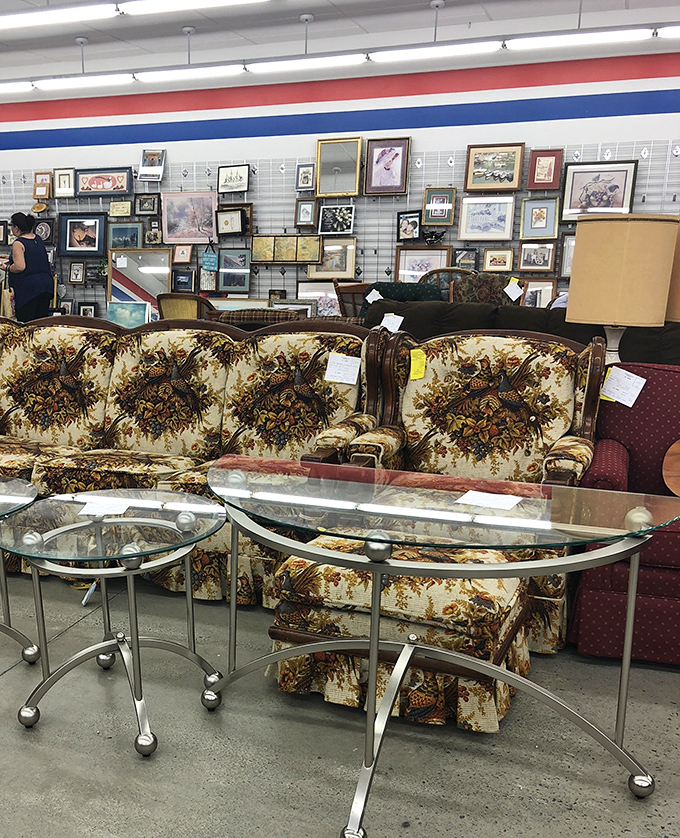 The furniture section – where vintage floral patterns meet modern sensibilities and every sofa has a story waiting to be continued.