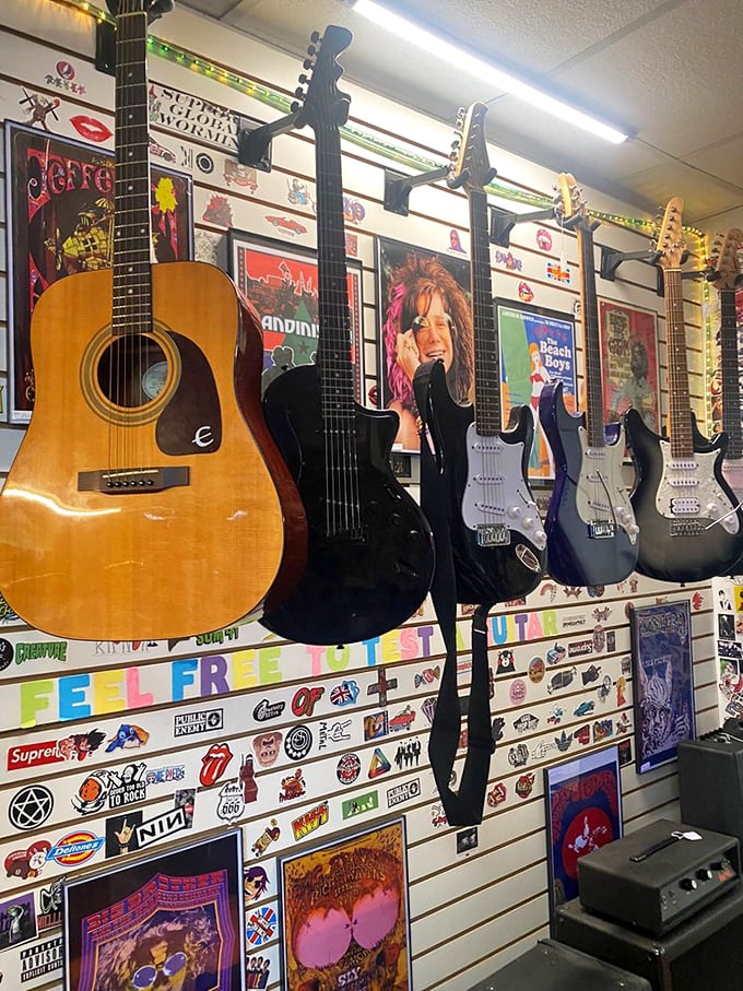 Rock history hangs in suspended animation. These guitars have stories to tell—some probably involving questionable hairstyles and regrettable fashion choices.