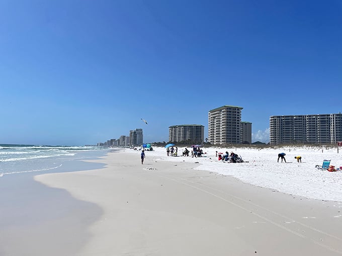 The beach stretches like nature's welcome mat alongside high-rises—a perfect illustration of Florida's delicate balance between preservation and development.