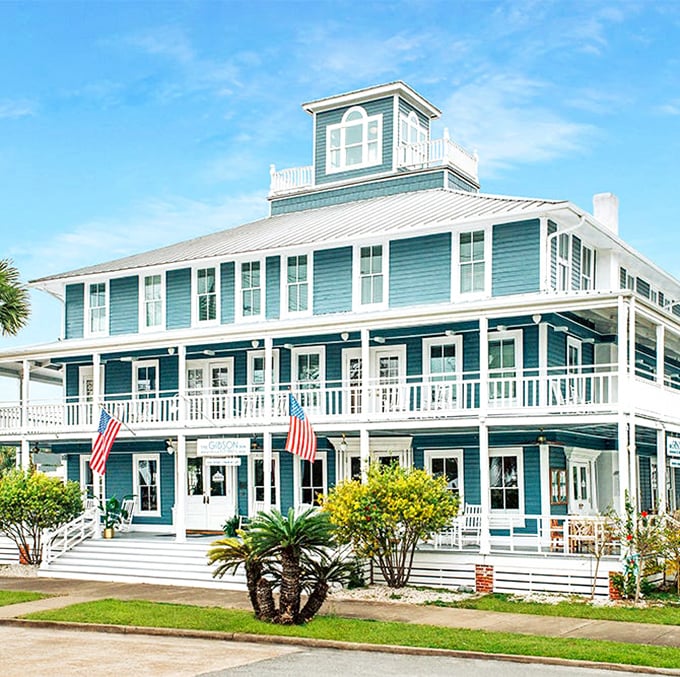 The Gibson Inn's teal elegance has welcomed weary travelers since steamboats ruled. Today's guests still swear they can hear history creaking in the floorboards.