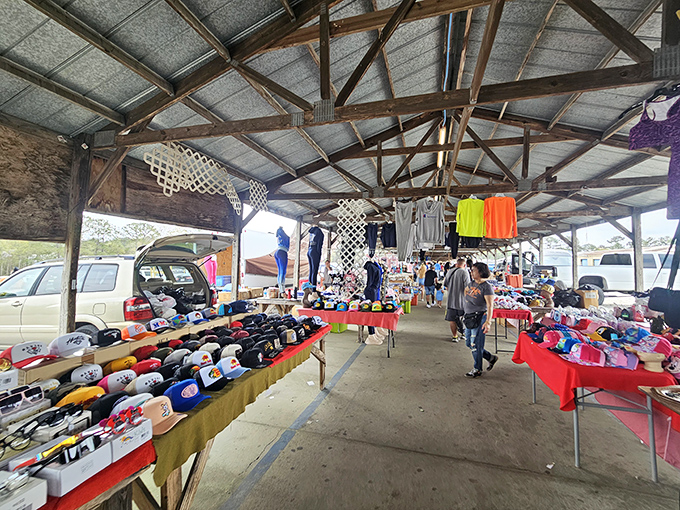 Baseball caps, sports memorabilia, and everyday essentials line the aisles where shoppers navigate this indoor treasure trove with the focus of archaeologists.