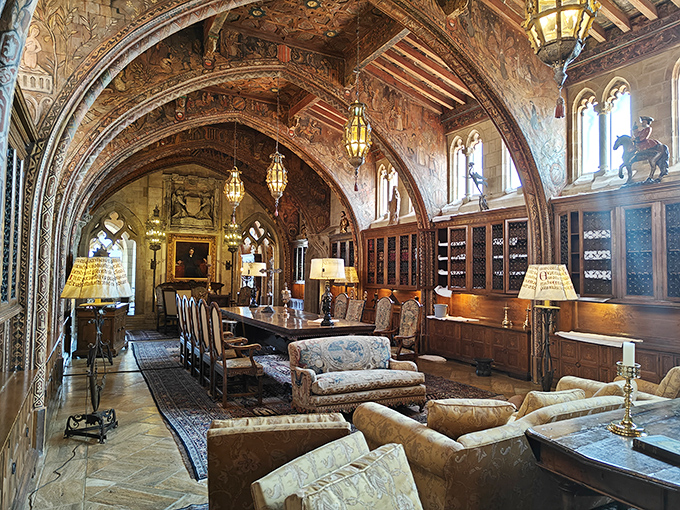 The Gothic Study's arched ceilings and hanging lanterns create the perfect ambiance for plotting newspaper empires or simply enjoying a good book.