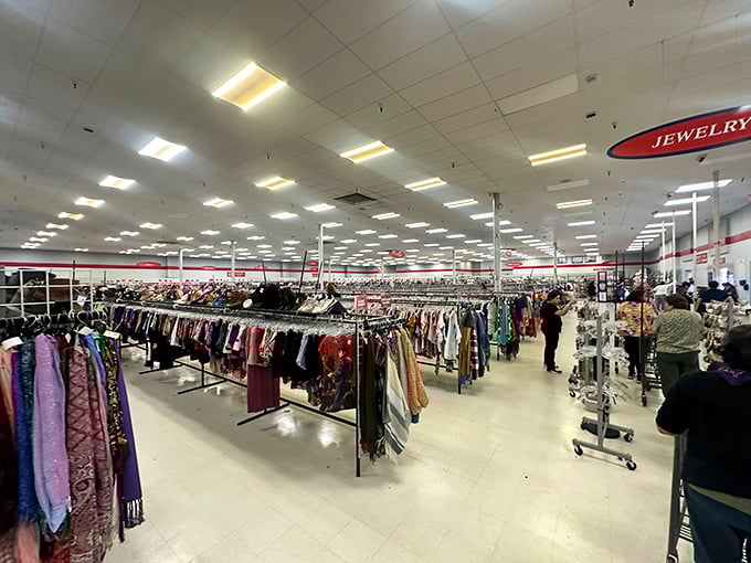 A sea of clothing racks stretches toward the horizon, creating a textile landscape that would make Marie Kondo break out in hives.