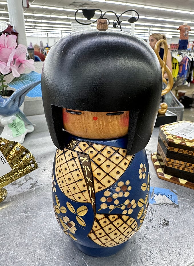 This wooden kokeshi doll isn't just decoration—it's waiting to become the conversation piece your mantel desperately needs.