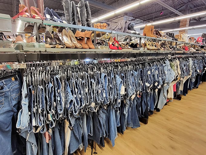The denim library would make Marie Kondo weep with joy. Every shade of blue, perfectly organized—a far cry from chaotic thrift store bins.