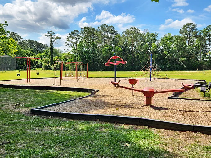 Childhood still happens outdoors in Monticello. This playground proves that sometimes the simplest pleasures—swings, slides, and open sky—are the most profound.