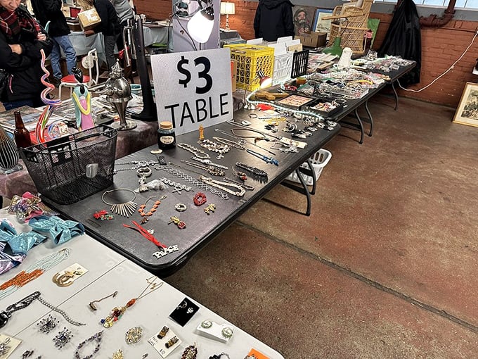 The "$3 Table" sign might as well read "Danger Zone" for your wallet – affordable treasures that whisper "take me home" to passersby.