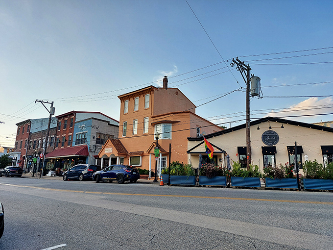 The golden hour bathes these historic buildings in warm light, transforming an ordinary street into something from a storybook.