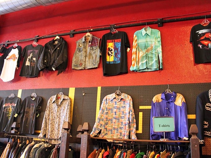The wall of vintage shirts reads like a timeline of American pop culture—from faded band tees to that Hawaiian shirt your cool uncle would've worn in 1978.