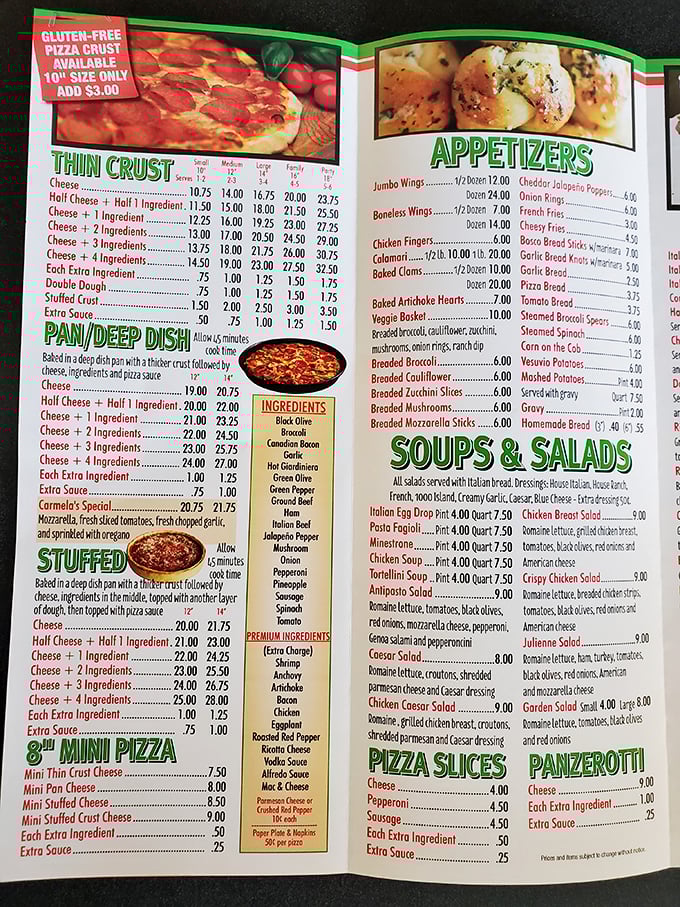 The menu tells the delicious story—pan pizza, stuffed pizza, and Carmela's Special waiting to change your life.
