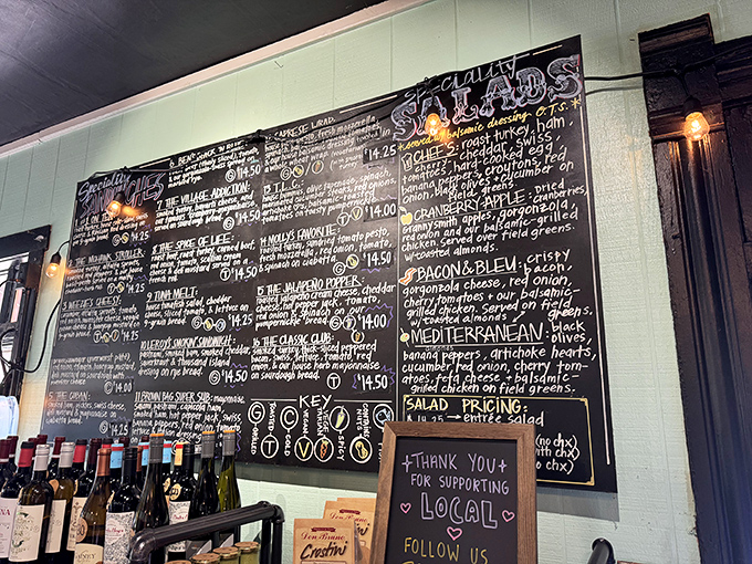 The chalkboard menu reads like poetry for the hungry—each handwritten offering promising a different path to sandwich nirvana.
