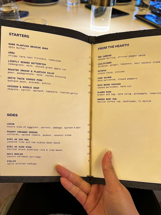 This isn't just a menu—it's a passport to flavor country. From plantain brioche buns to smoked beef rib, each description promises a culinary adventure.