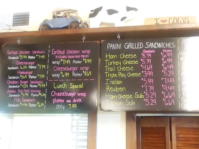 This menu board isn't just a list—it's a roadmap to happiness. The "Triple Play Cheese" sandwich sounds like it was invented by someone who truly understands life's priorities.