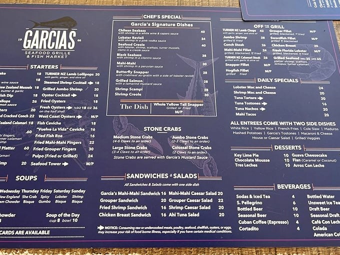 This menu isn't just a list—it's a maritime treasure map where X marks the spot for stone crabs, yellowtail snapper, and seafood combos.