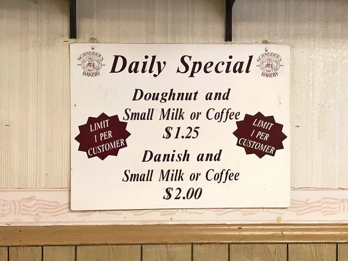 The daily special board offers prices that feel like a time machine to simpler days – when a buck and change could buy a moment of pure bliss.