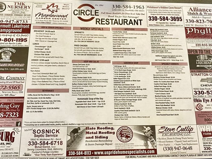 The menu doubles as local advertising, a small-town innovation that tells you everything you need to know – this place is woven into community fabric.