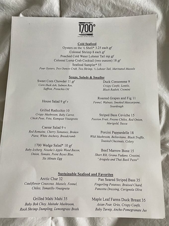 The menu reads like poetry for food lovers – from colossal shrimp to sweet corn chowder, each description promises a flavor adventure.