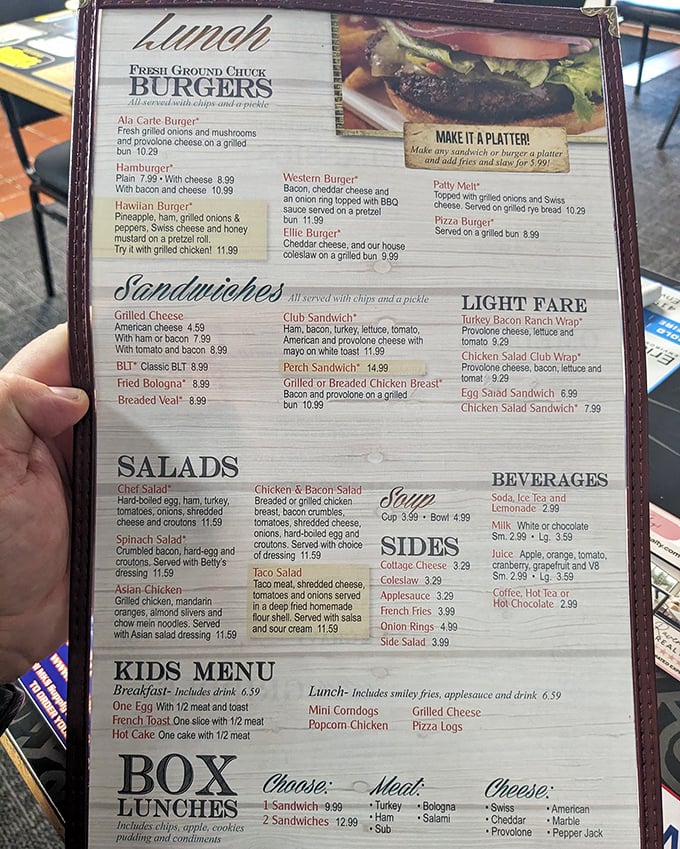 A menu that reads like comfort food poetry. No molecular gastronomy here—just the promise of a fried bologna sandwich that might change your life.