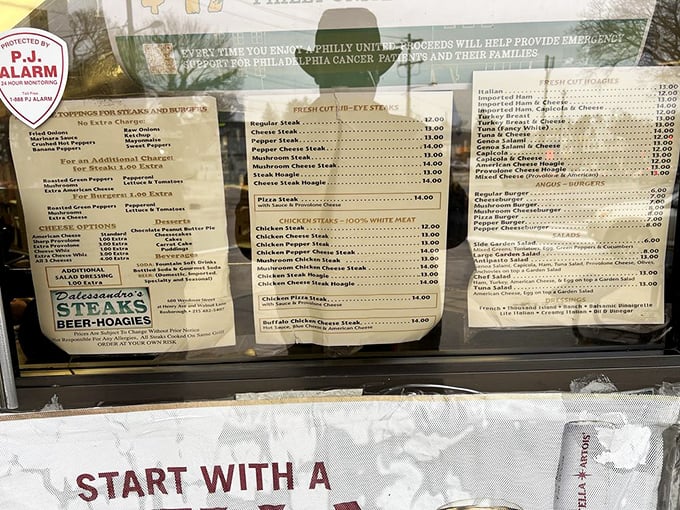 The menu board tells you everything you need to know—this place isn't about fancy descriptions, it's about delivering Philadelphia's favorite sandwich.