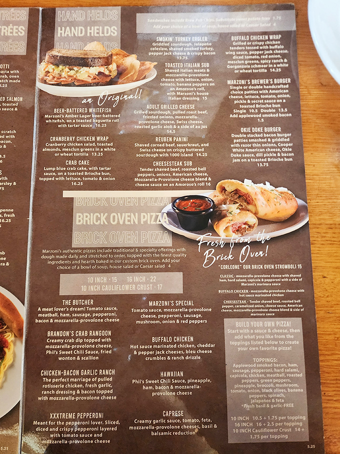 A menu that reads like a love letter to comfort food. Each description promises a dish that your grandmother would approve of, if grandma had a brick oven and brewing equipment.