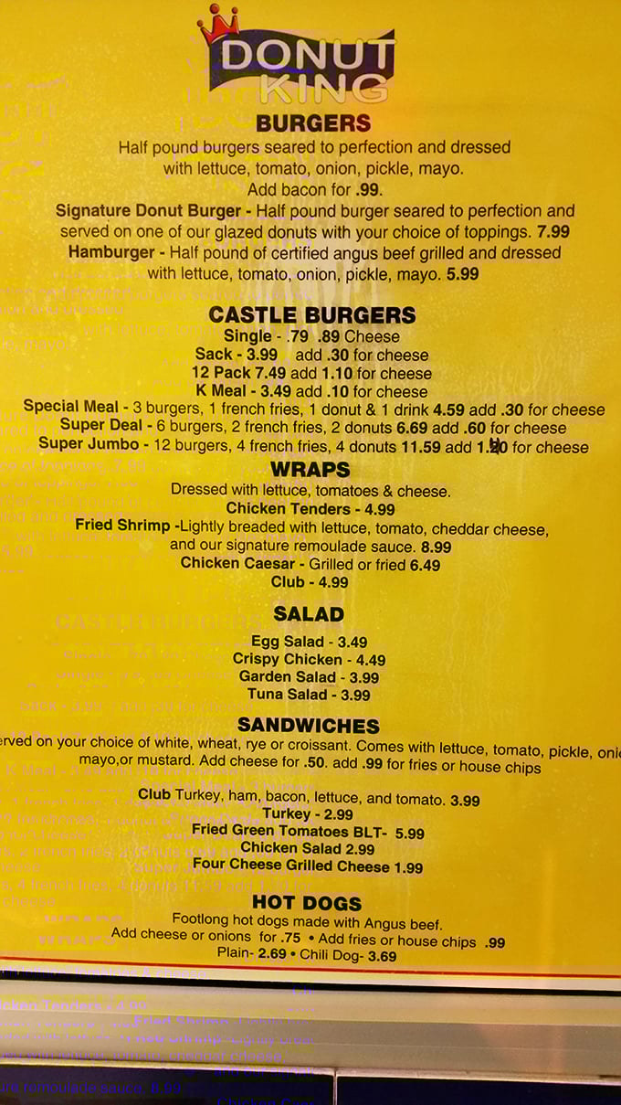 The menu reveals Donut King's split personality—half sweet paradise, half savory haven. That Donut Burger isn't just a novelty, it's a revelation.