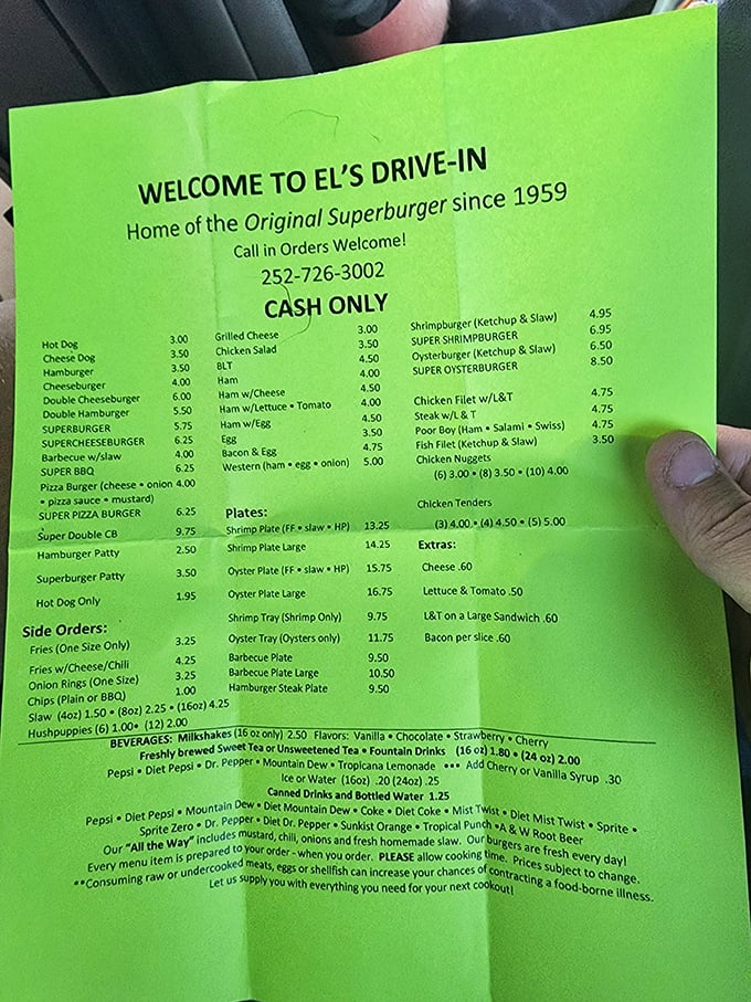 The legendary menu, printed on eye-catching green paper. Like a treasure map where X marks the Super Burger—and everything else worth eating.